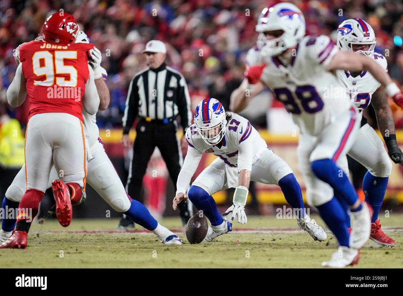 Buffalo Bills quarterback Josh Allen (17) recoveres a fumble on the ...
