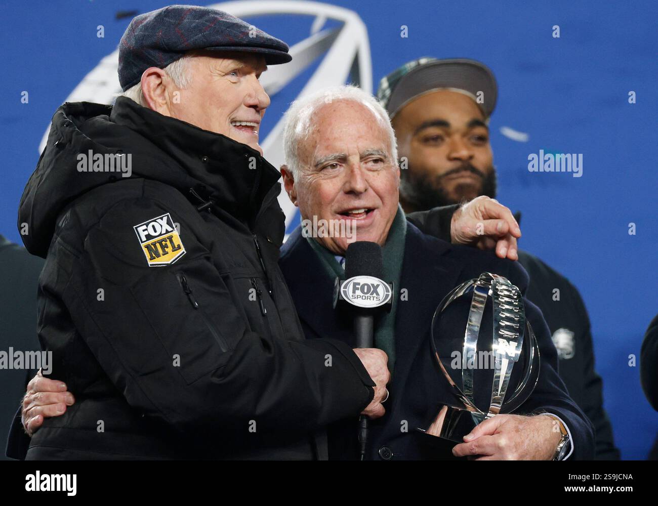 Philadelphia Eagles owner Jeffrey Lurie holds the trophy as he talks to ...