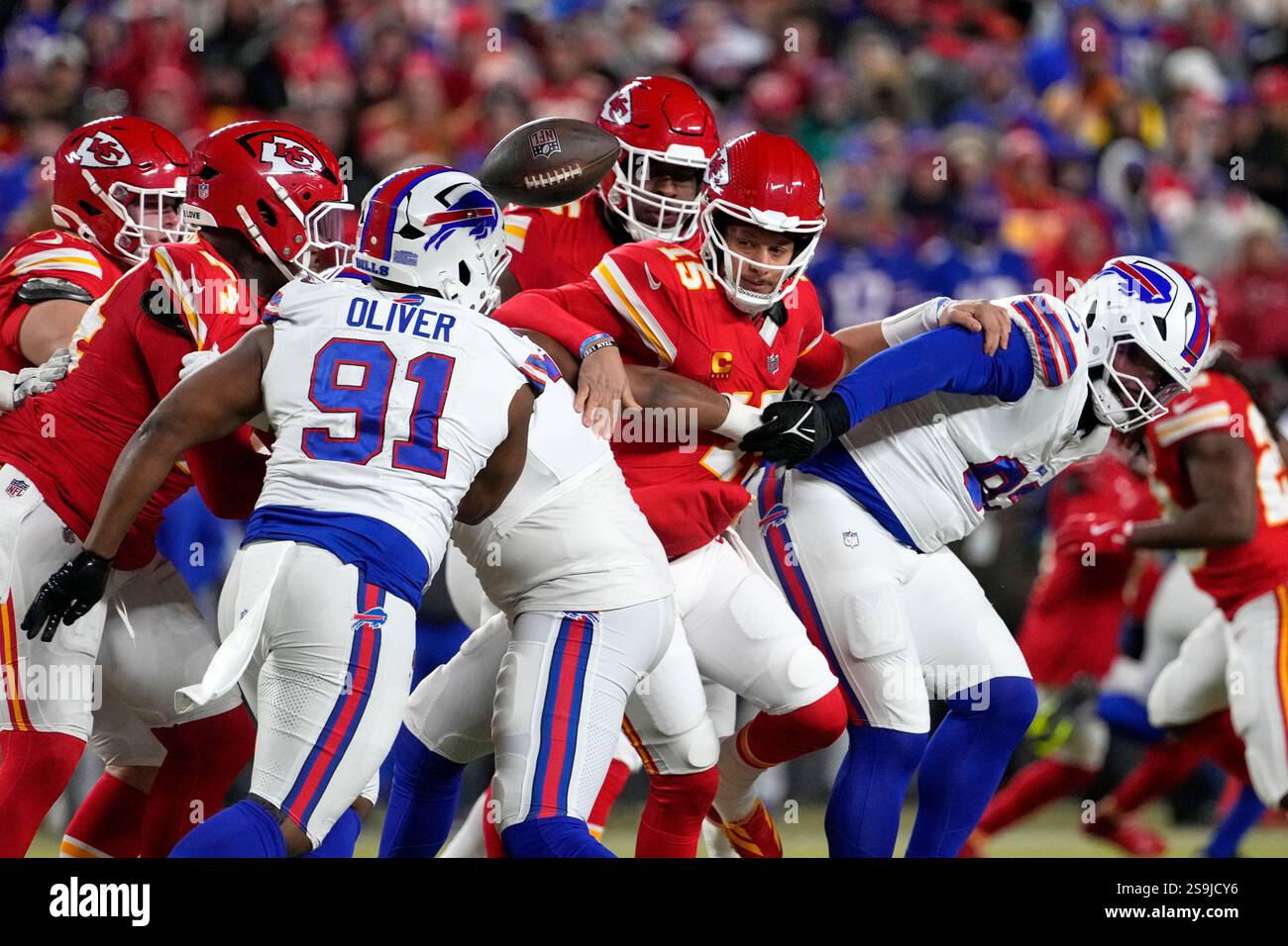 Kansas City Chiefs quarterback Patrick Mahomes (15) loses the ball as ...
