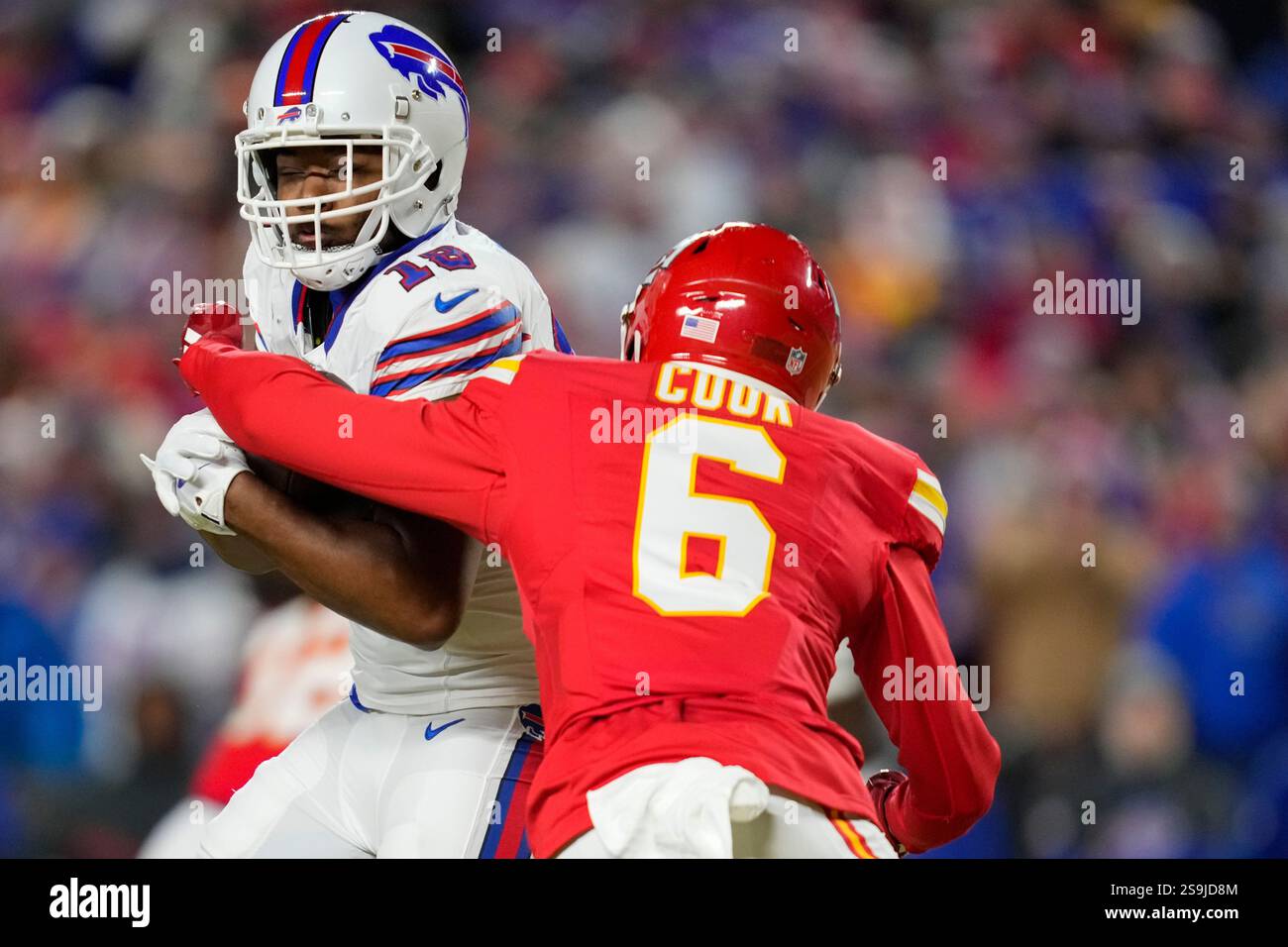 Buffalo Bills wide receiver Amari Cooper (18) is hit by Kansas City ...