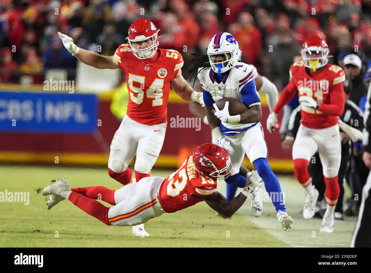 Buffalo Bills running back James Cook (4) runs for a first down as ...