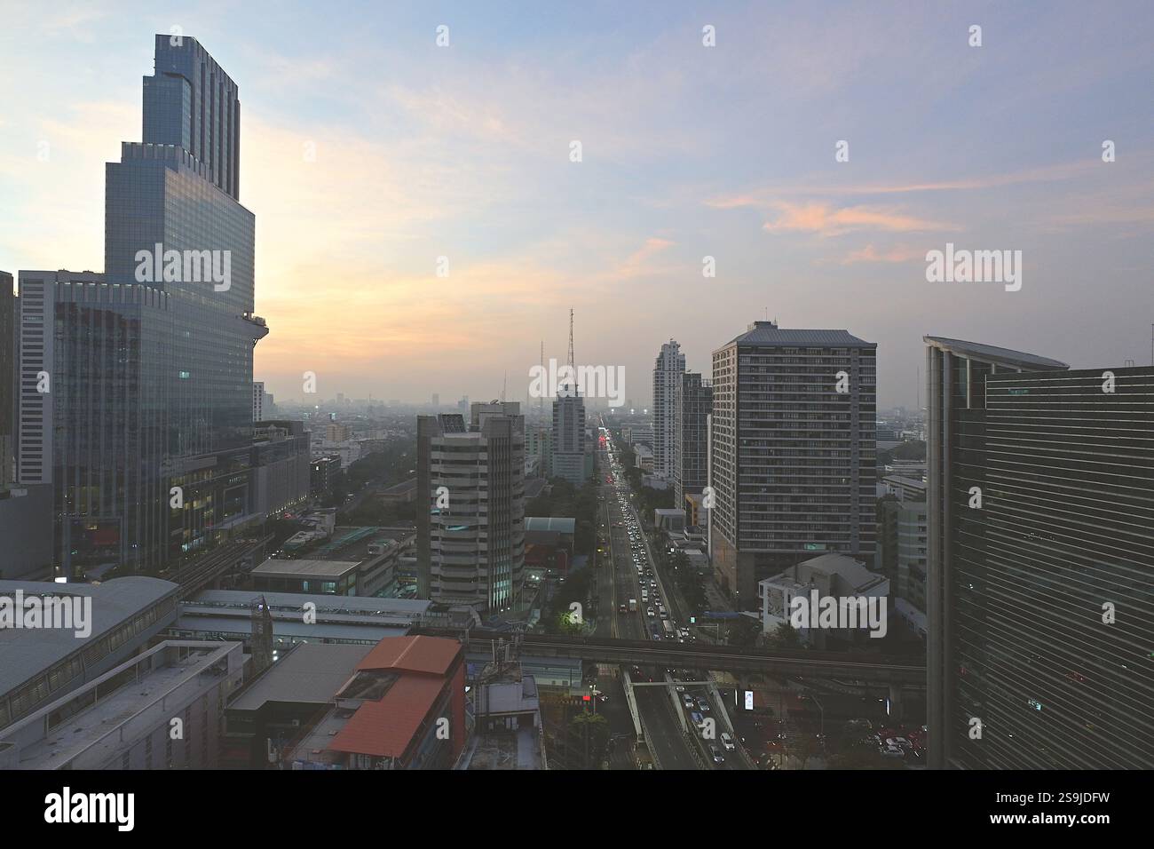 Evening traffic and smog over Si Ayutthaya Road at busy Phaya Thai ...