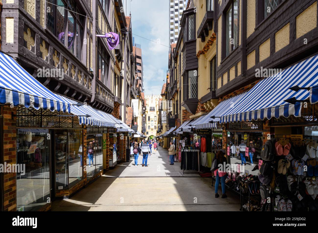 People walking and shopping at London Court, a tudor-style shopping ...