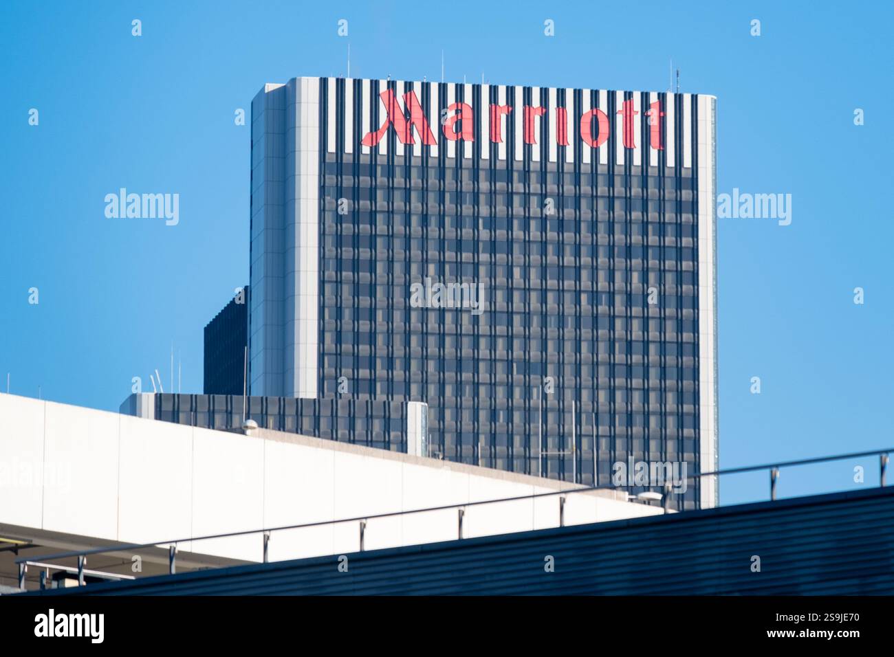 modern Marriott hotel building, travel hospitality, sleek glass facade ...