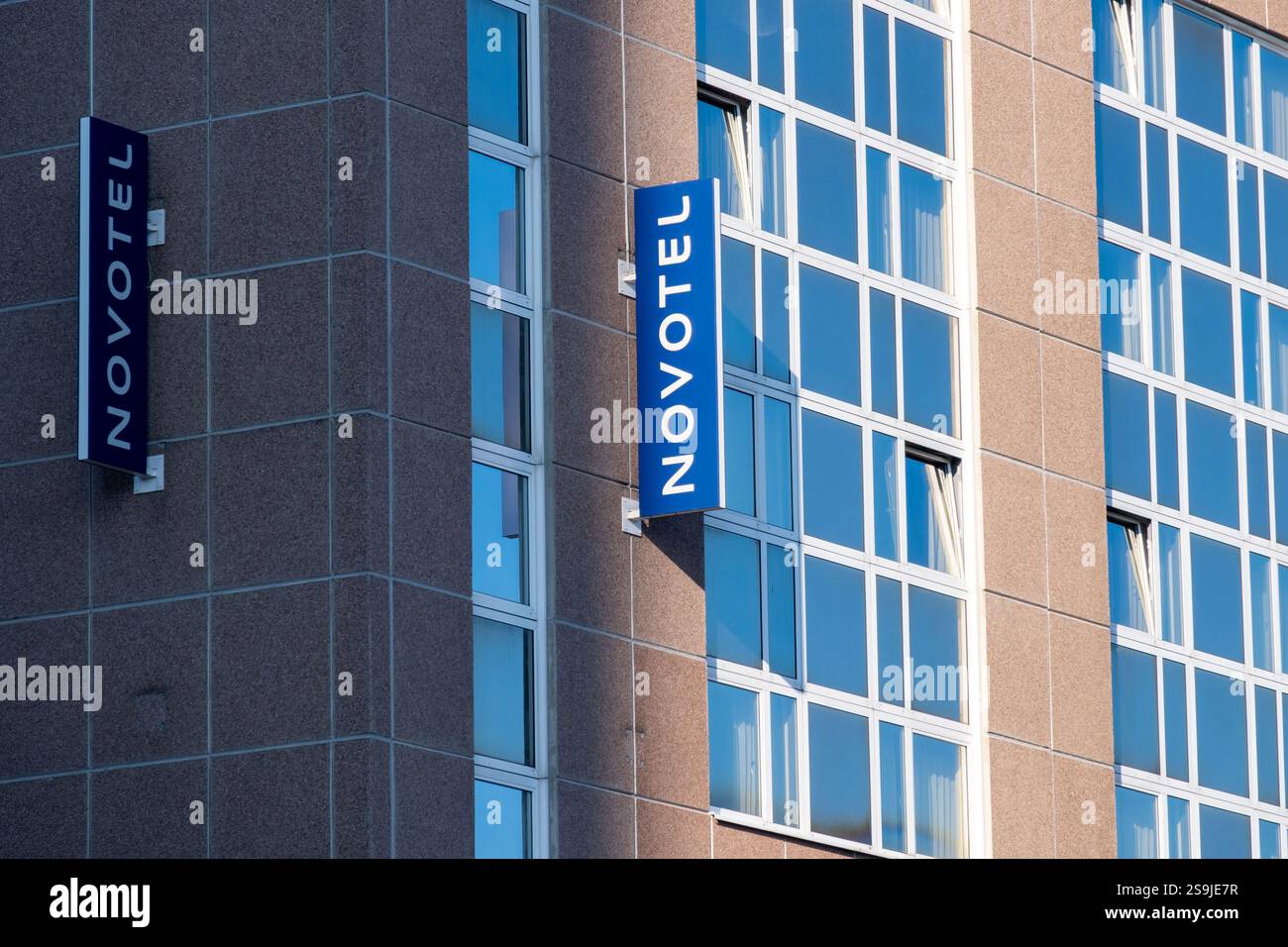 modern Marriott hotel building, travel hospitality, sleek glass facade ...