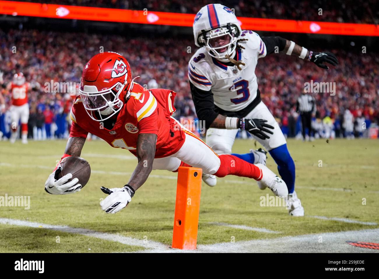 Kansas City Chiefs wide receiver Xavier Worthy (1) leaps into the end zone for a touchdown ...
