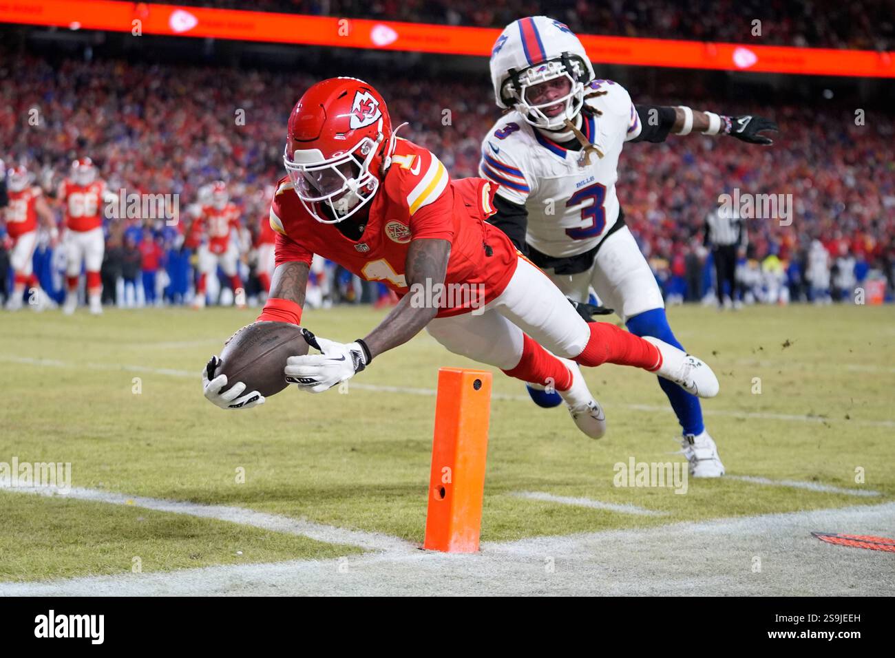 Kansas City Chiefs wide receiver Xavier Worthy (1) leaps into the end zone for a touchdown ...