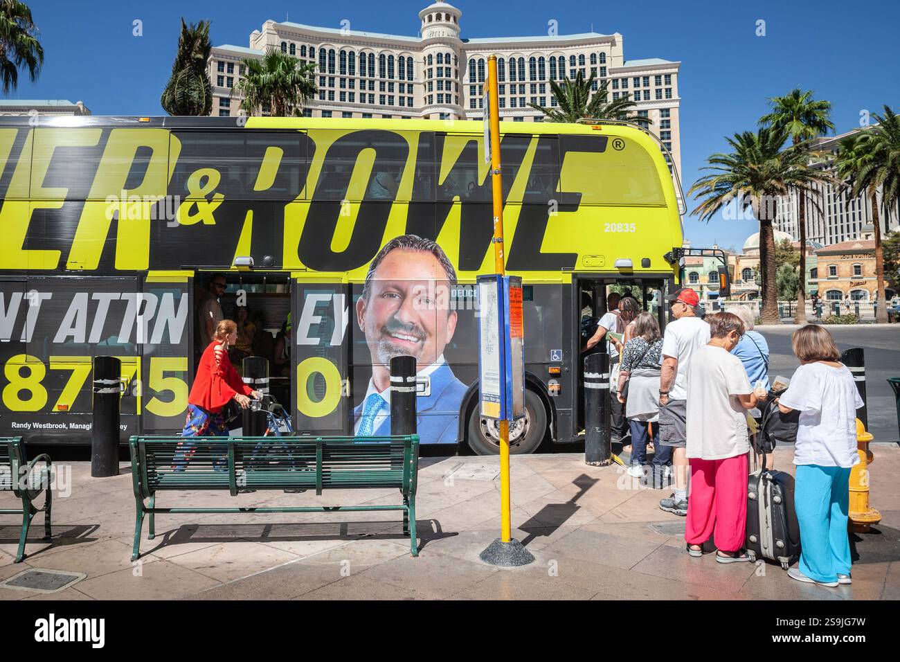 LAS VEGAS, AUGUST 21, 2024: People queue to board the Deuce bus along ...
