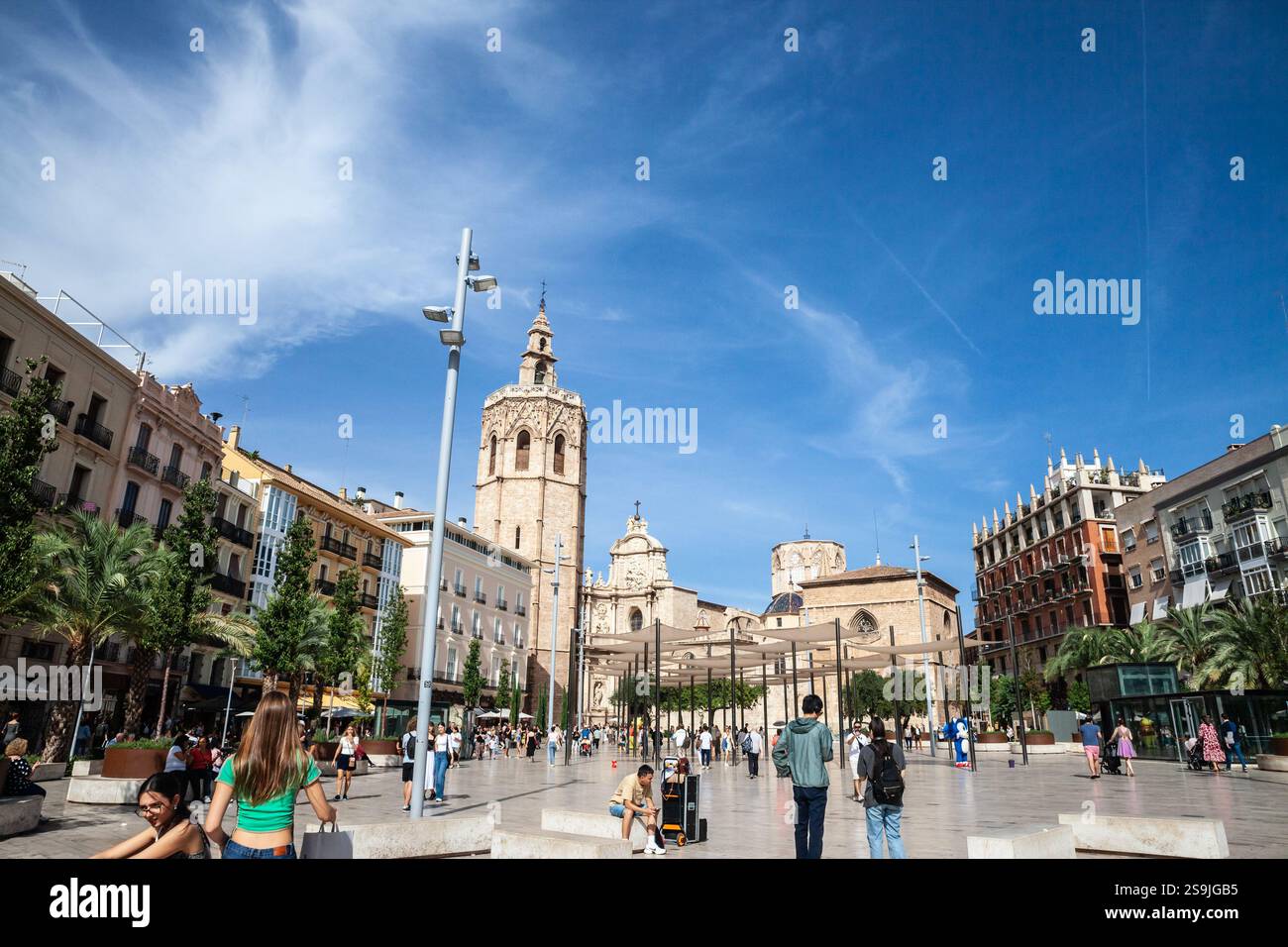 VALENCIA, SPAIN - OCTOBER 12, 2024: Crowds gather at the lively Plaza ...