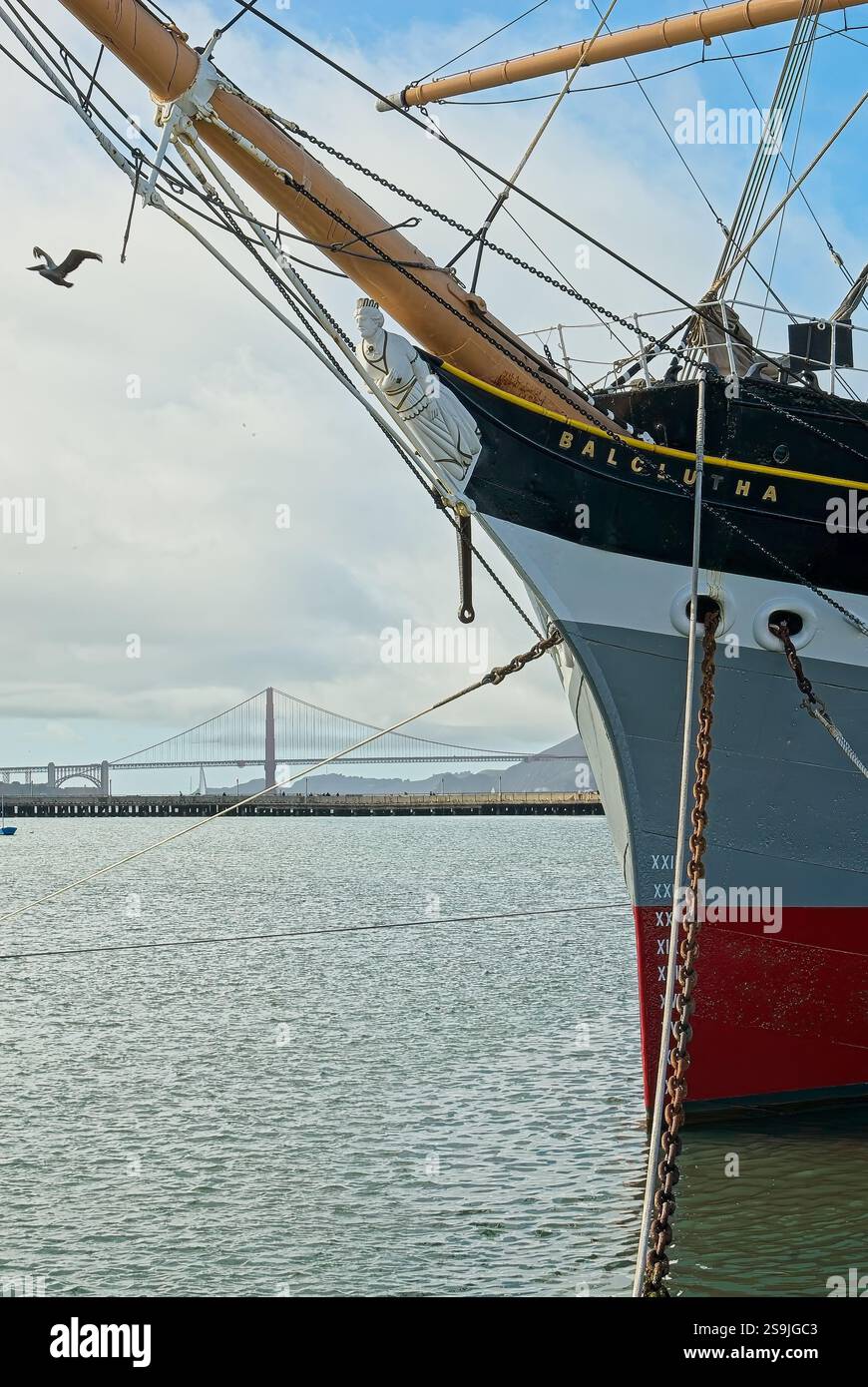 Mooring lines lead to 1886 square rigged sailing ship Balclutha with ...