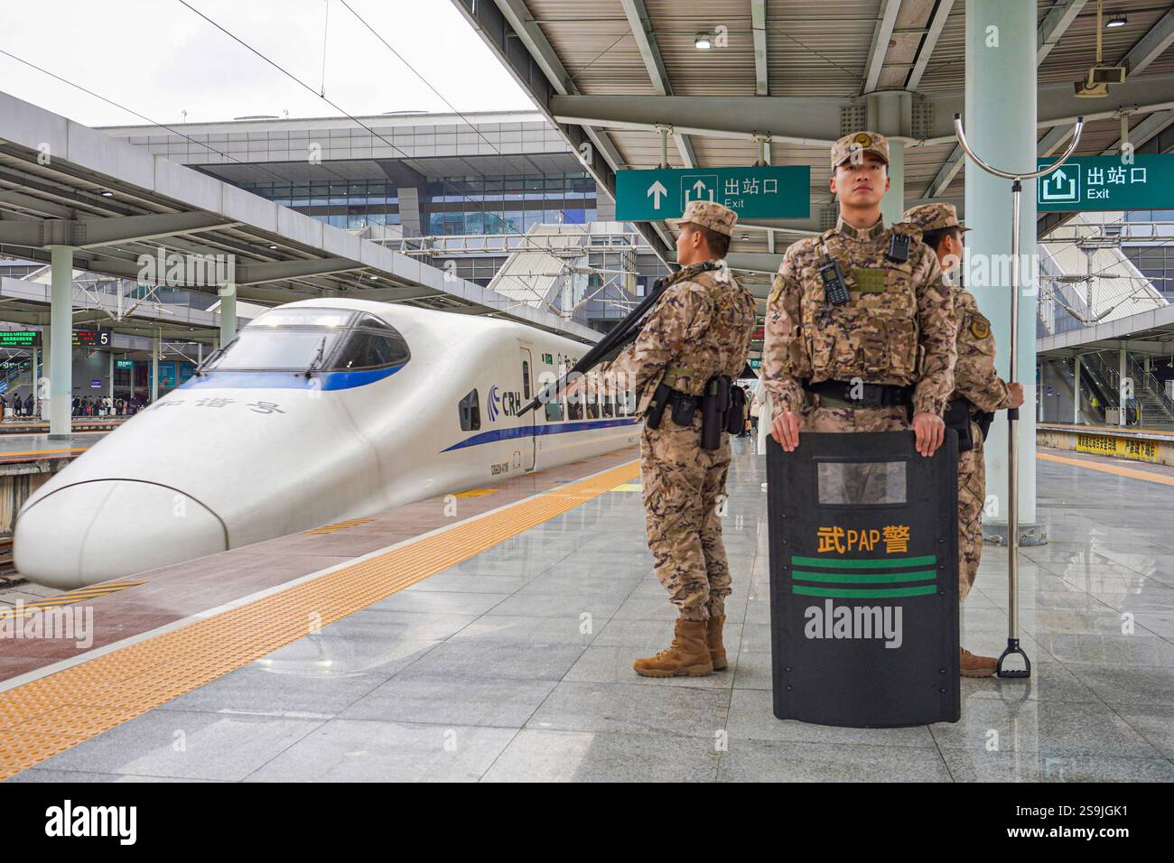 LIUZHOU, CHINA - JANUARY 26, 2025 - Armed police officers patrol a ...