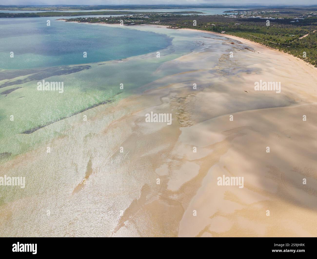 Aerial view of a coastal sand dune and wide beach at low tide at Gunyah Beach on the Eyre ...