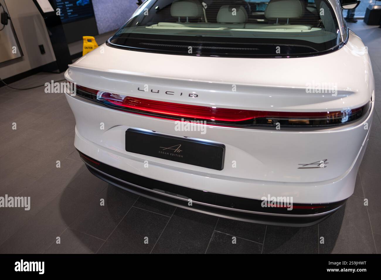 deep red electric Lucid Air, battery electric 4-door luxury sedan ...