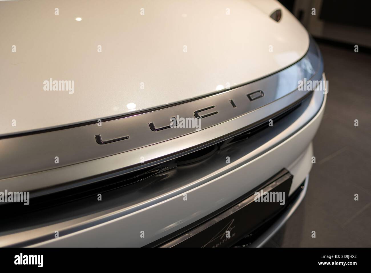 deep red electric Lucid Air, battery electric 4-door luxury sedan ...