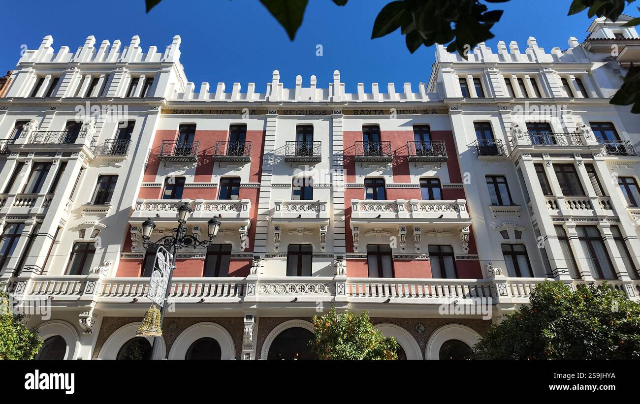 A historic building in Seville with intricate architectural details and ...