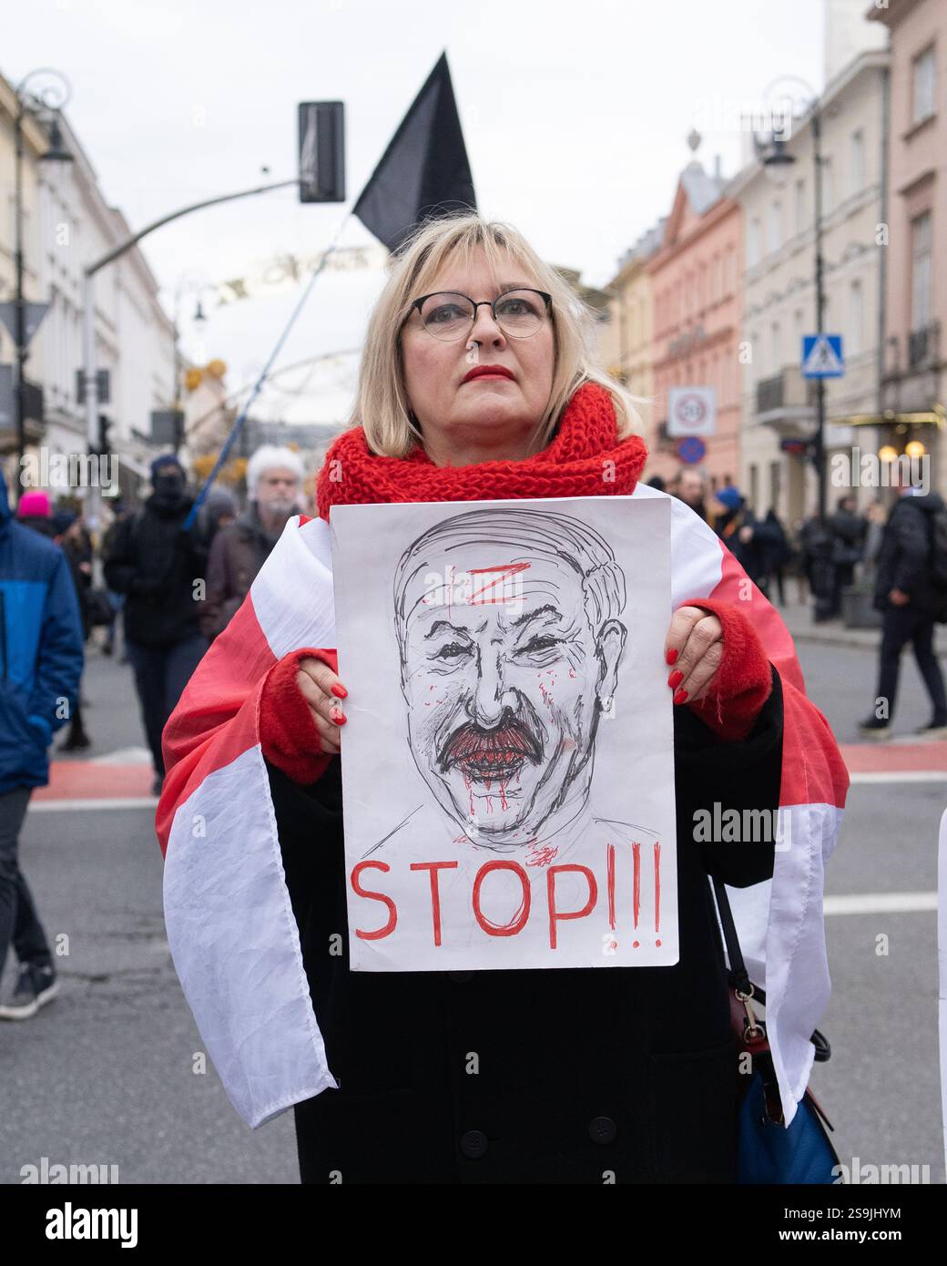 Warsaw, Poland. 26th Jan, 2025. A woman wrapped in a historical ...