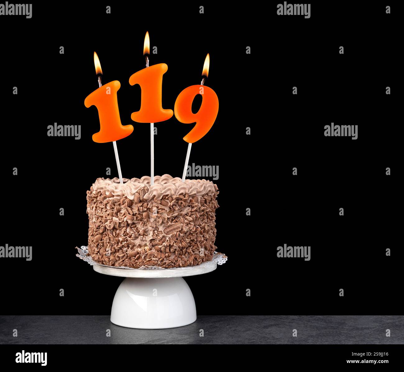 Birthday cake with number 119 candle - Anniversary card on a black ...