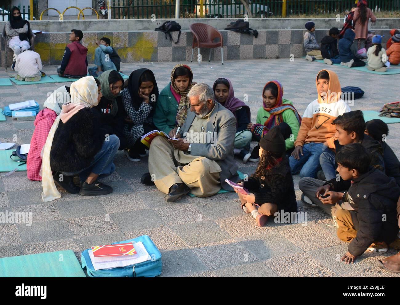 Muhammad Ayub has been running his free school for street children in a F-6/2 park in Islamabad ...