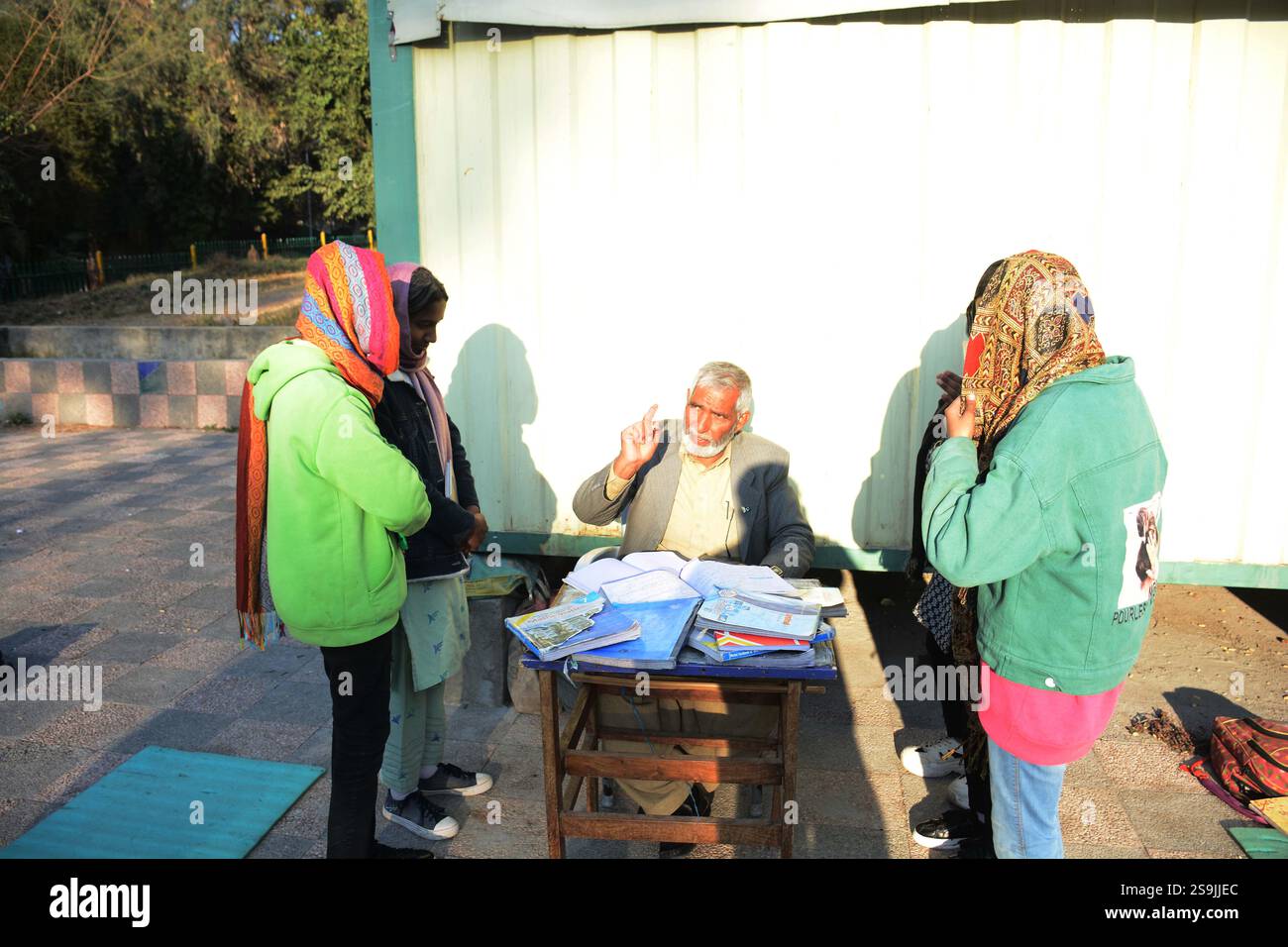 Muhammad Ayub has been running his free school for street children in a F-6/2 park in Islamabad ...