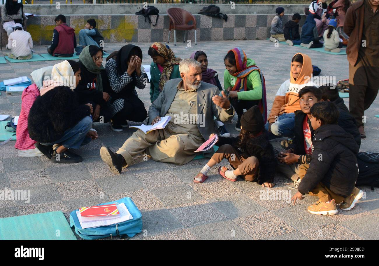 Muhammad Ayub has been running his free school for street children in a F-6/2 park in Islamabad ...