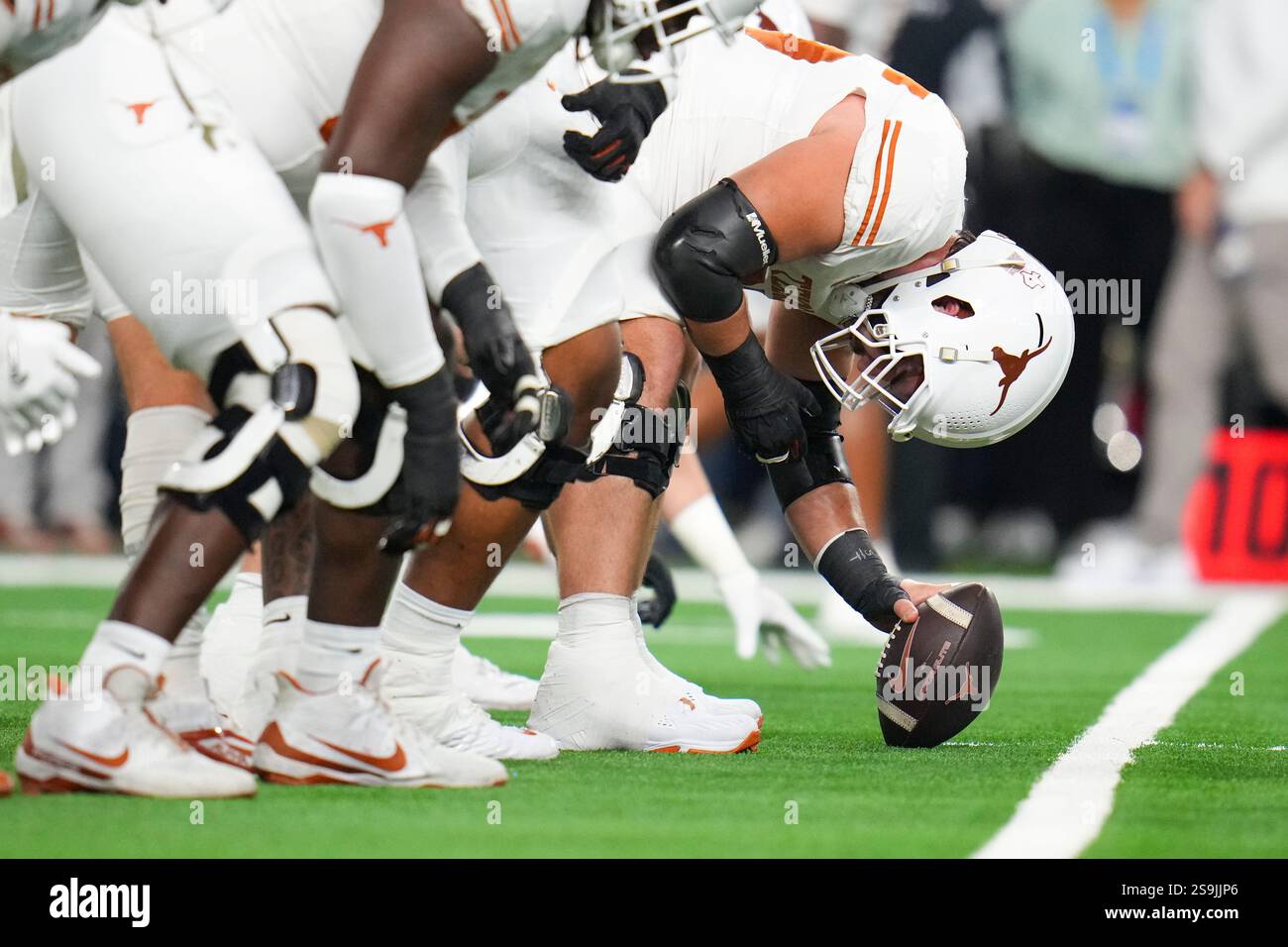 Texas offensive lineman Jake Majors (65) works out during the Cotton ...