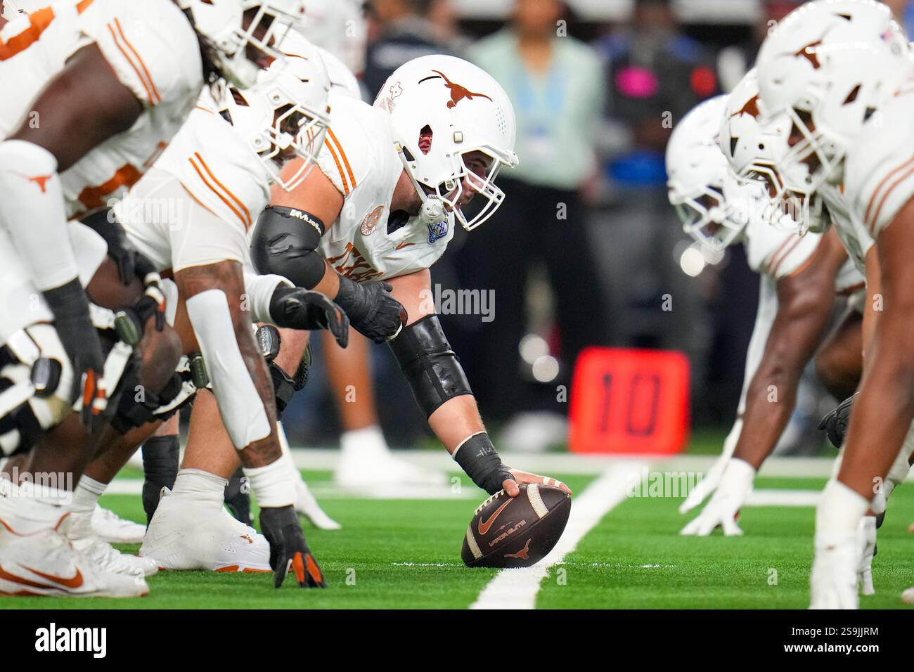 Texas offensive lineman Jake Majors (65) works out during the Cotton ...