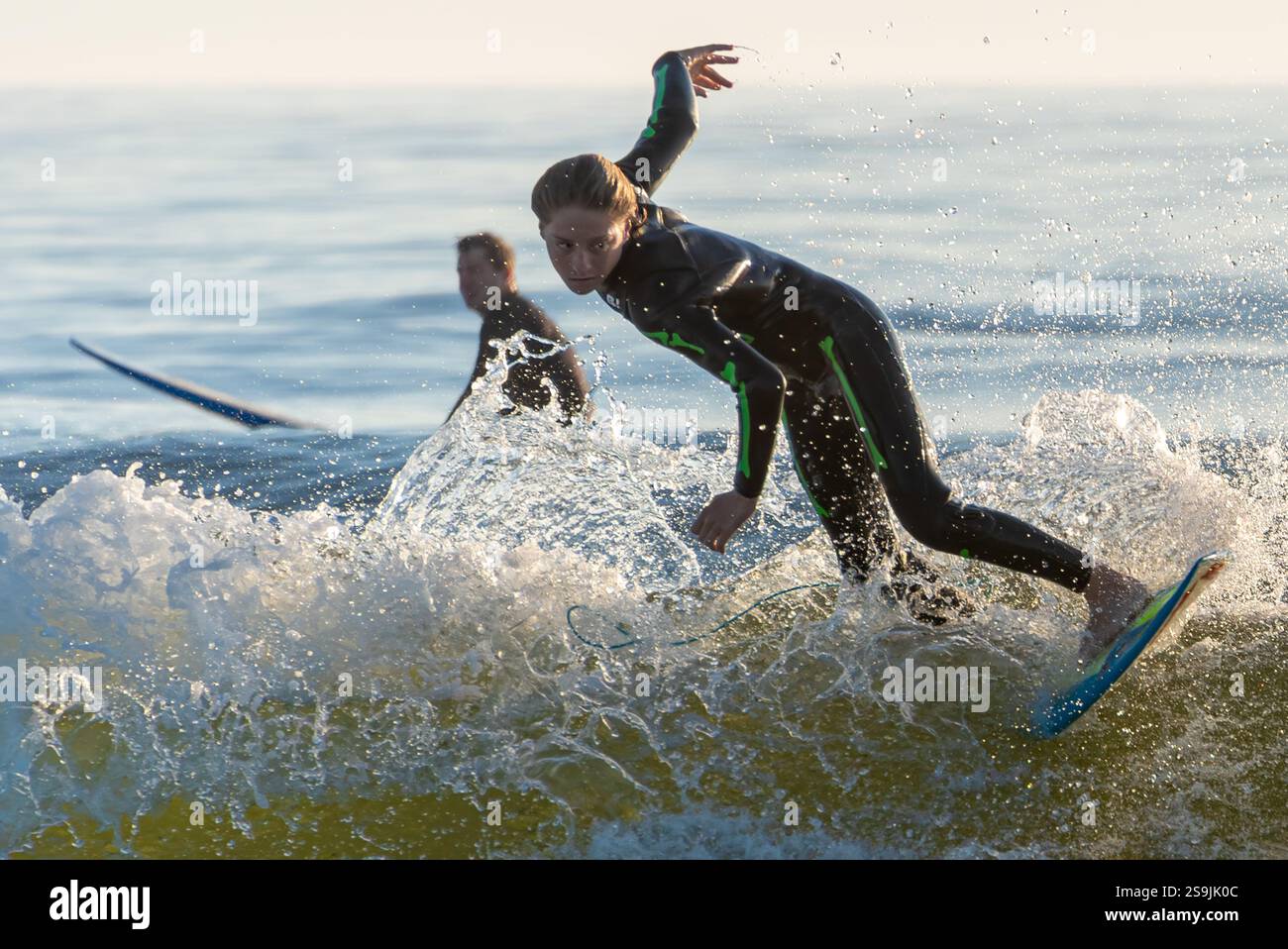 Jacksonville Beach surfers enjoying some early morning waves just after ...