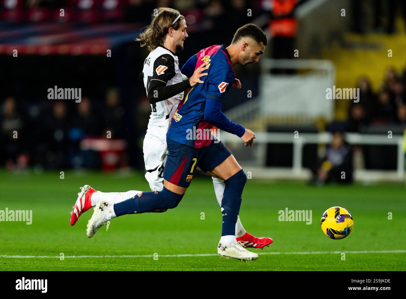 Ferran Torres (FC Barcelona) duels for the ball against Yarek ...