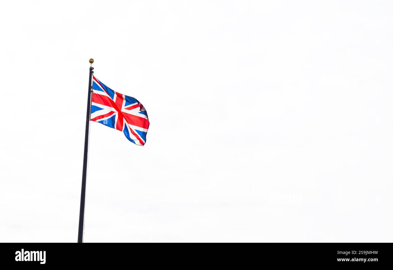 Template Union Jack Flag Of The United Kingdom Flying On A Flagpole ...