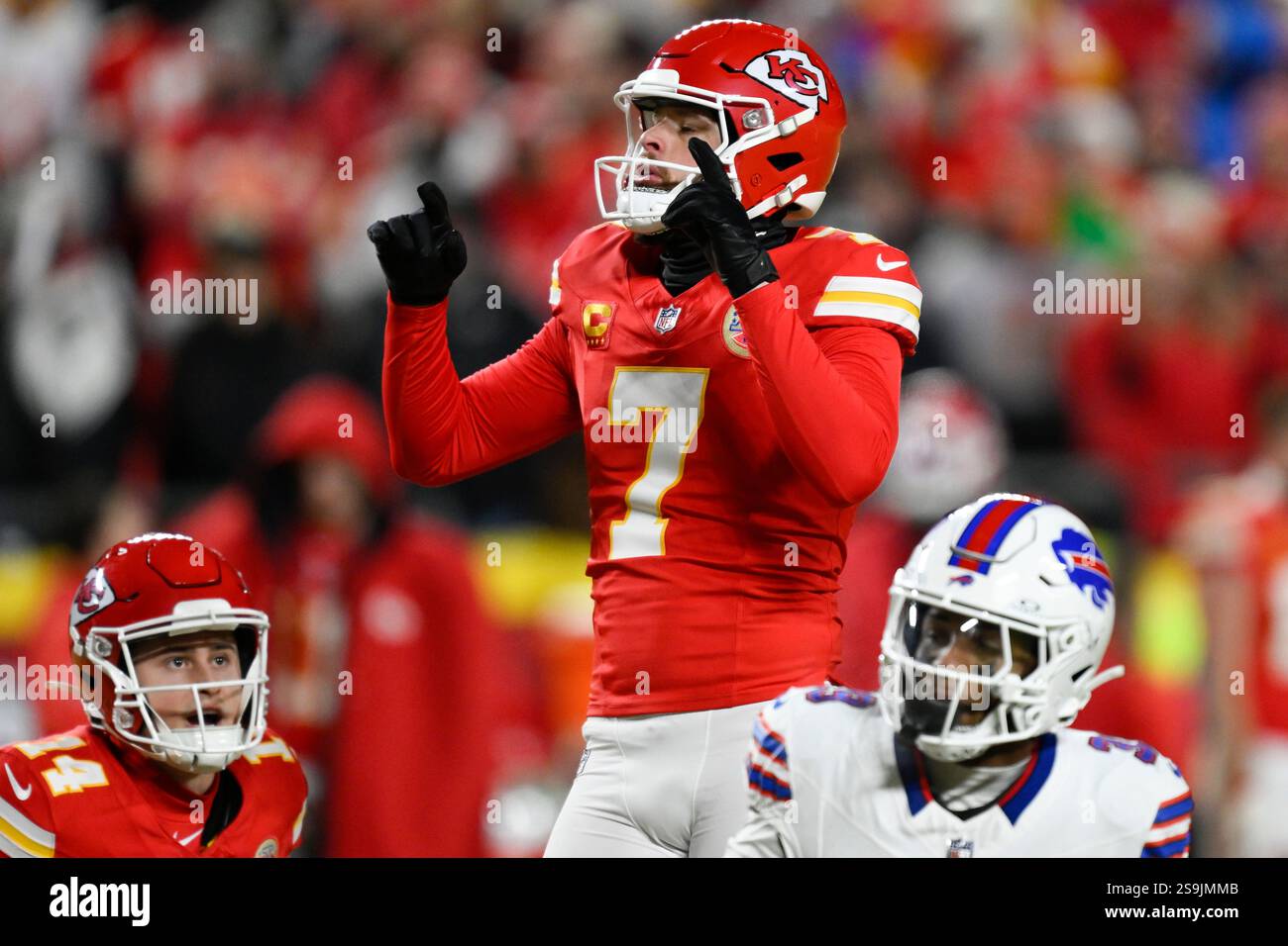 Kansas City Chiefs place kicker Harrison Butker (7) reacts to his field ...