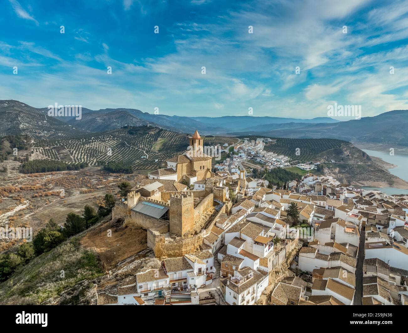 Aerial view of Iznajar castle white village in Andalucia, triangular ...