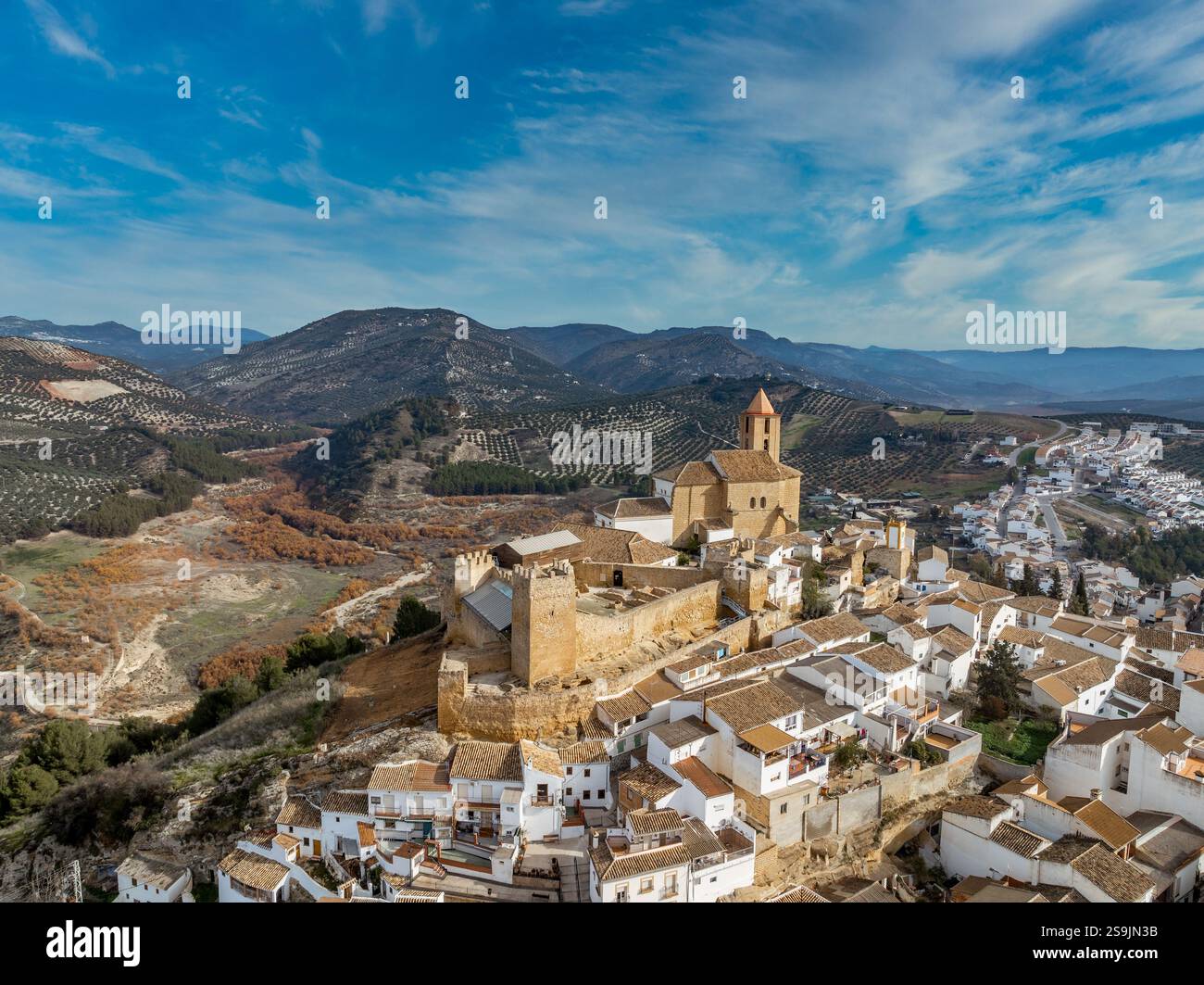Aerial view of Iznajar castle white village in Andalucia, triangular ...
