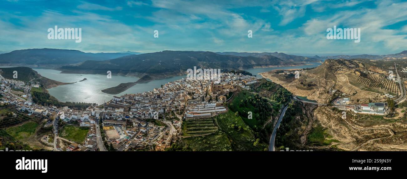Aerial view of beautiful white village Iznajar in Andalucia, Spain ...