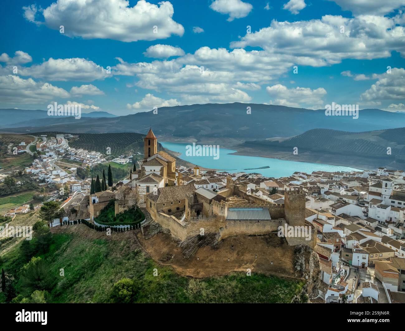 Aerial view of Iznajar castle white village in Andalucia, triangular ...