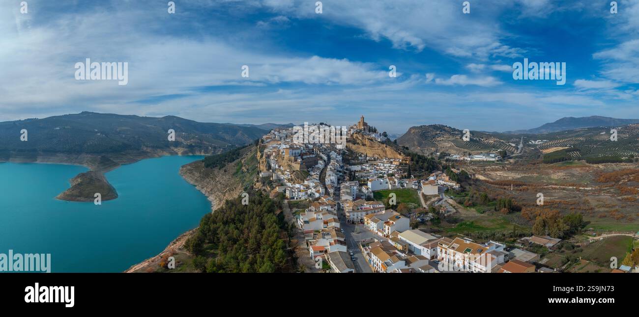 Aerial view of beautiful white village Iznajar in Andalucia, Spain ...
