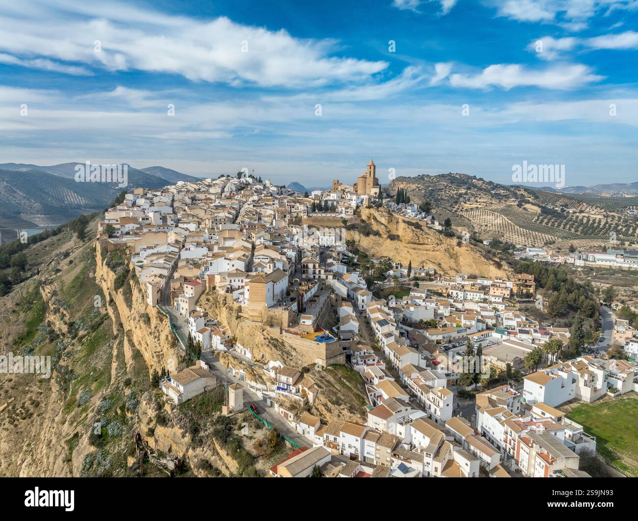 Aerial view of Iznajar castle white village in Andalucia, triangular ...