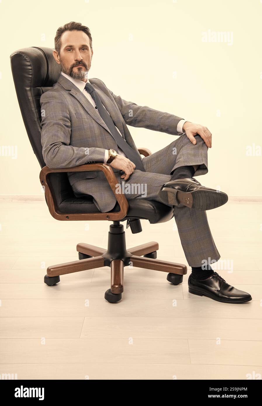 successful businessman man in boss office shows business success and ...