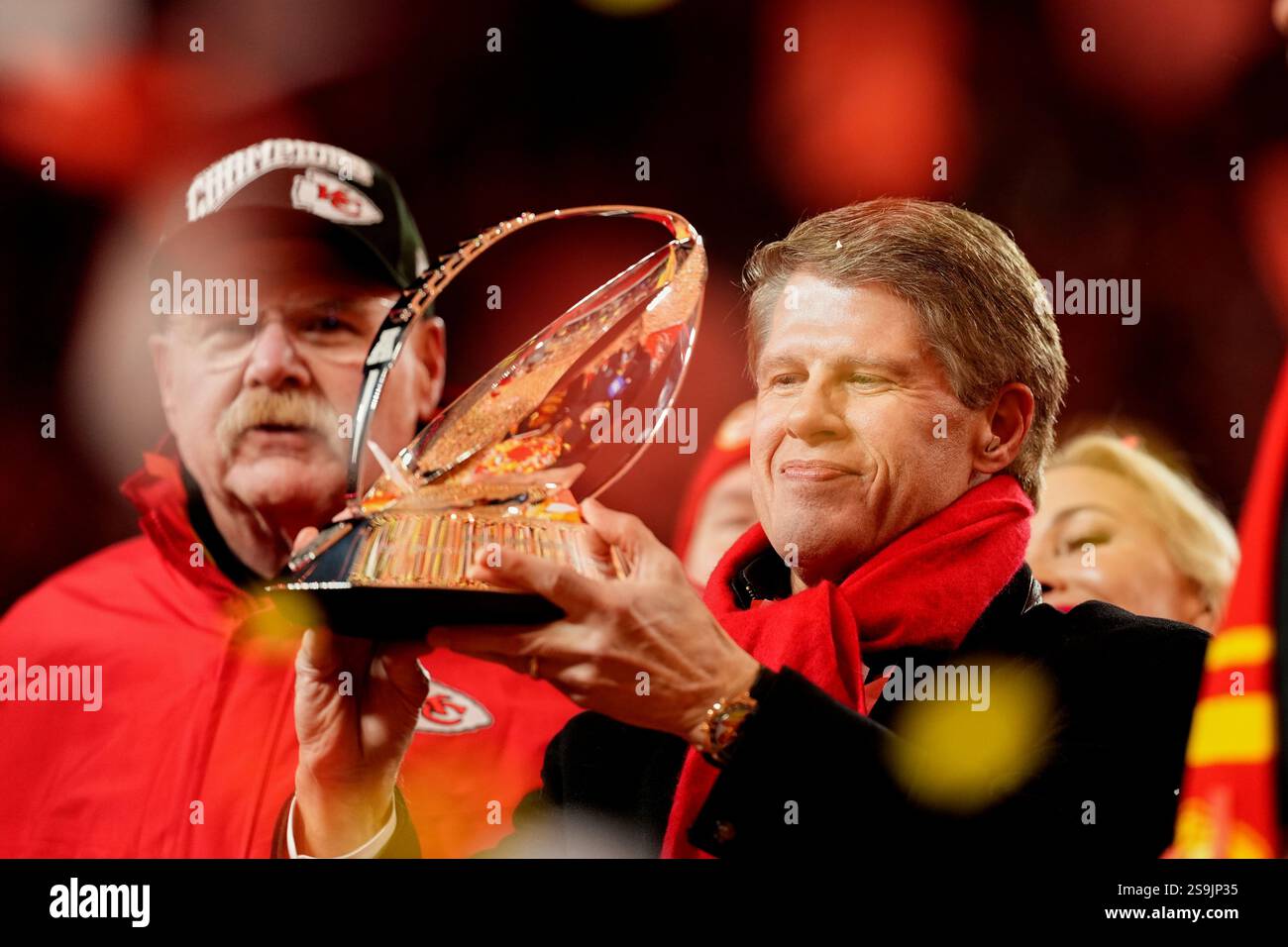 Kansas City Chiefs owner Clark Hunt holds the Lamar Hunt Trophy after ...