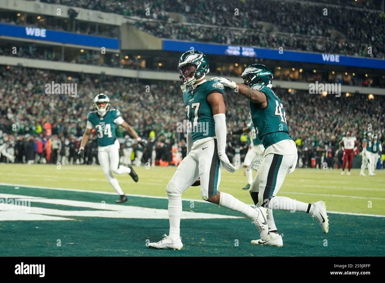 Philadelphia Eagles' Quinyon Mitchell (27), center, celebrates an ...
