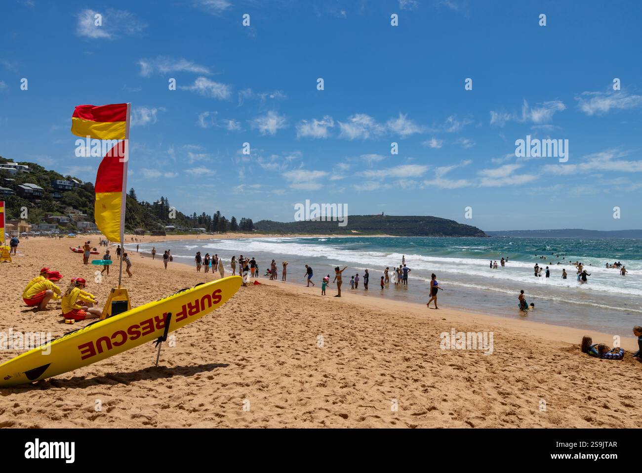 Palm Beach Sydney, summers day with surf rescue volunteers patrolling th beach and urging ...