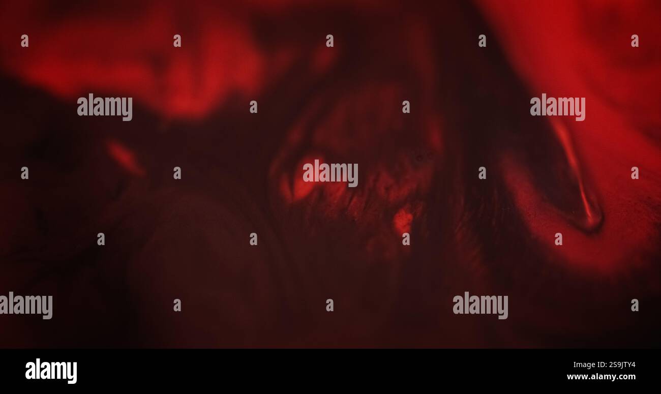 Hot fume swirl. Blur paint mix. Defocused red black color mist texture ...