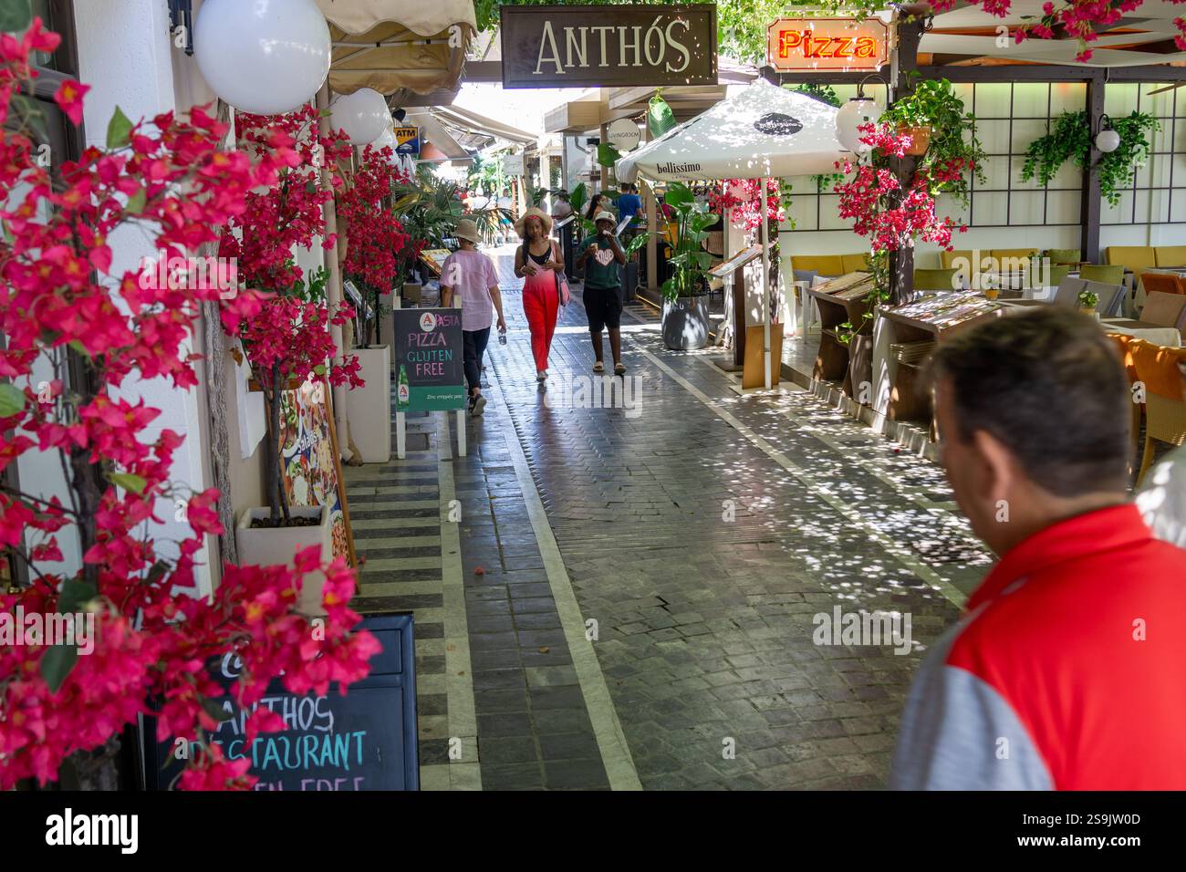 Rethimno Crete - August 18 2024; Urban street scene where stores open ...