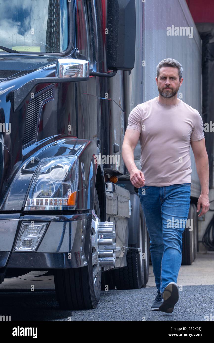 Truck driver. CDL. Portrait of trucker standing by his truck vehicle ...