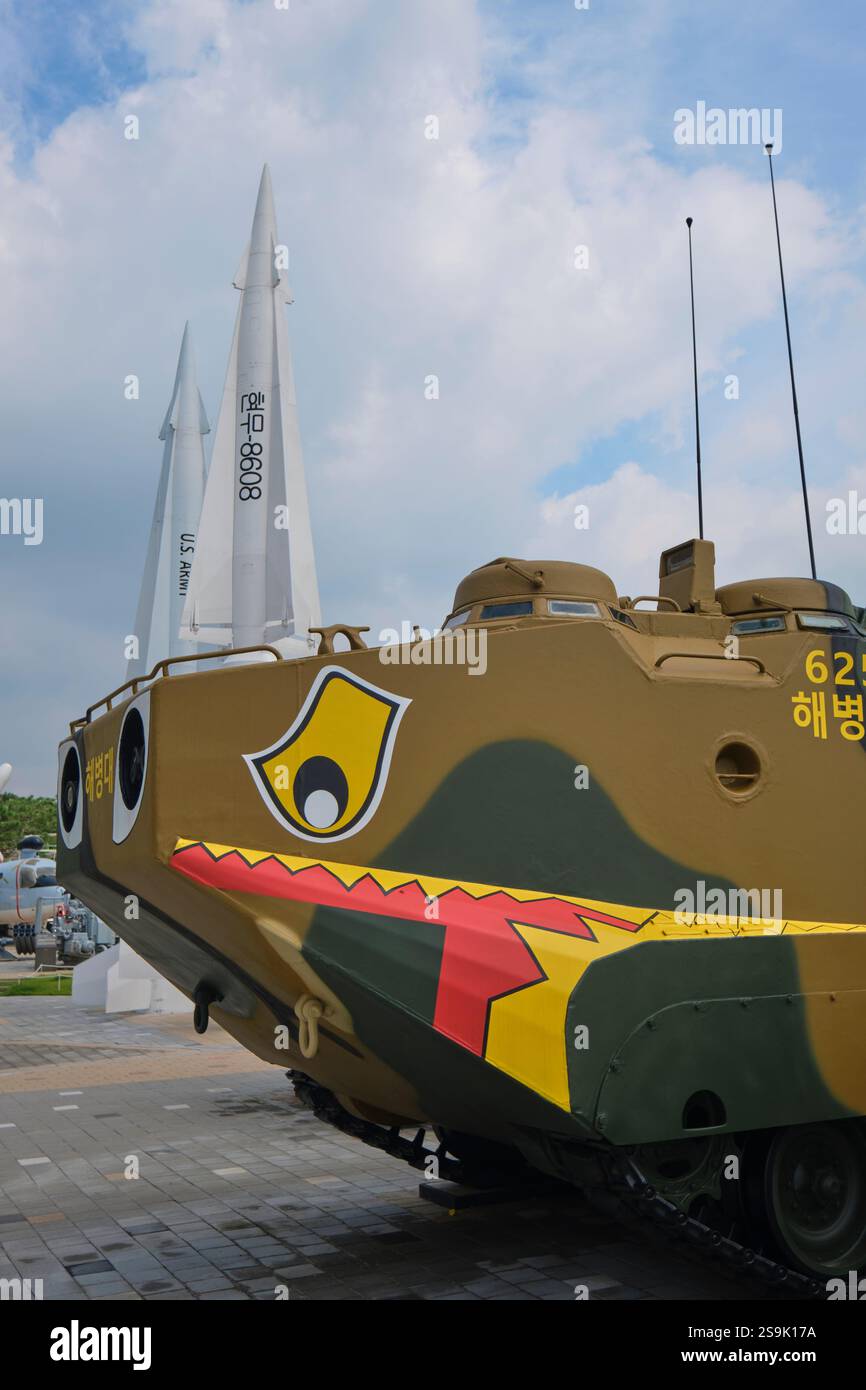 Detail of a tank paint job with a funny, cool face painted on the front ...