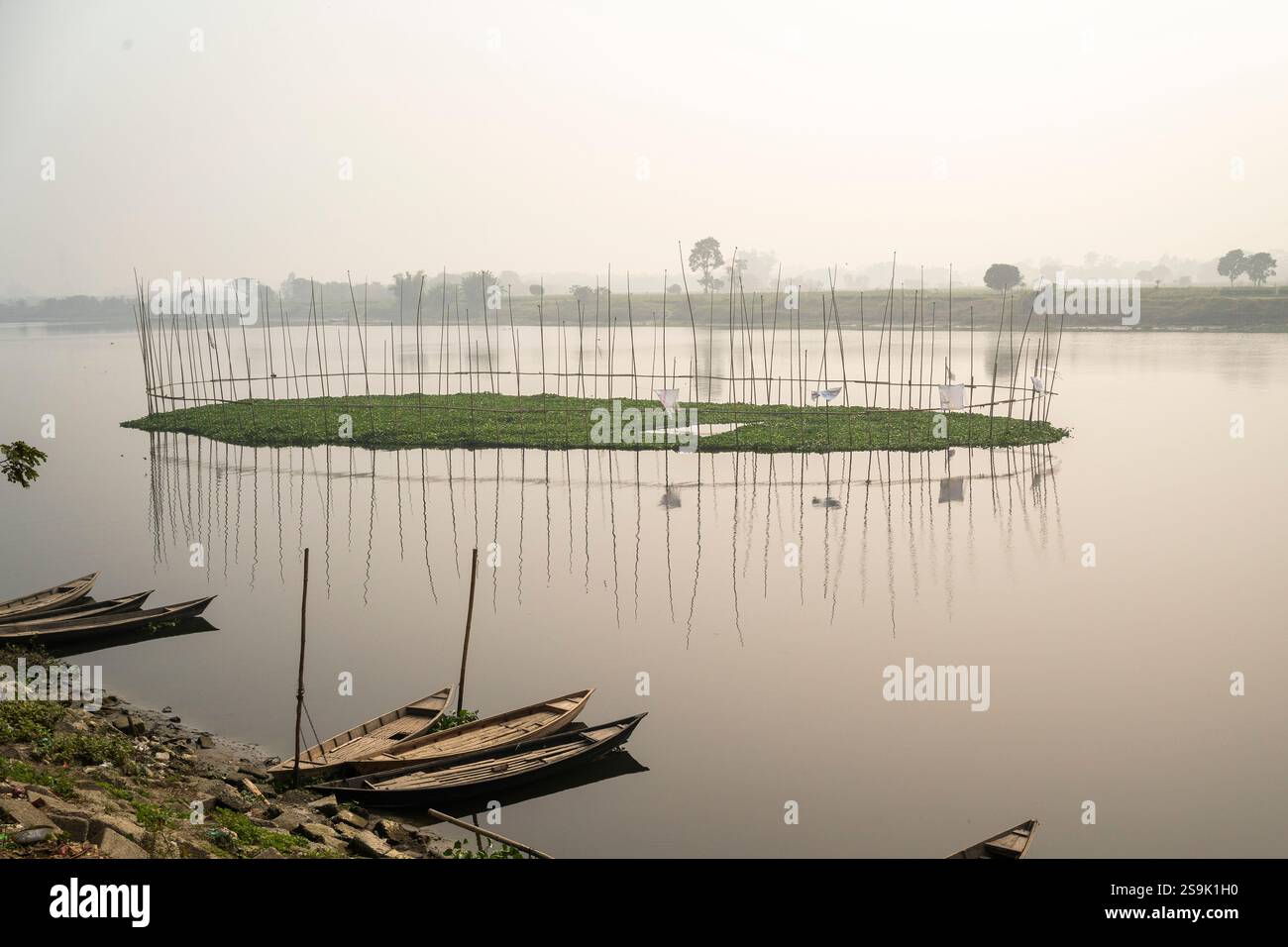 Boat and protected water body near Dhaka Stock Photo - Alamy