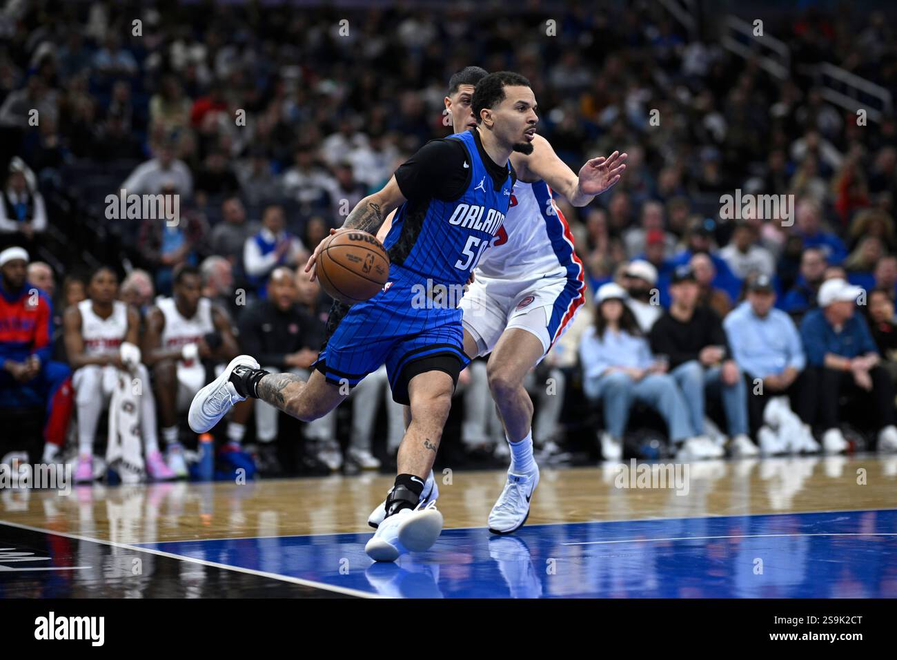 Orlando Magic guard Cole Anthony (50) drives past Detroit Pistons ...