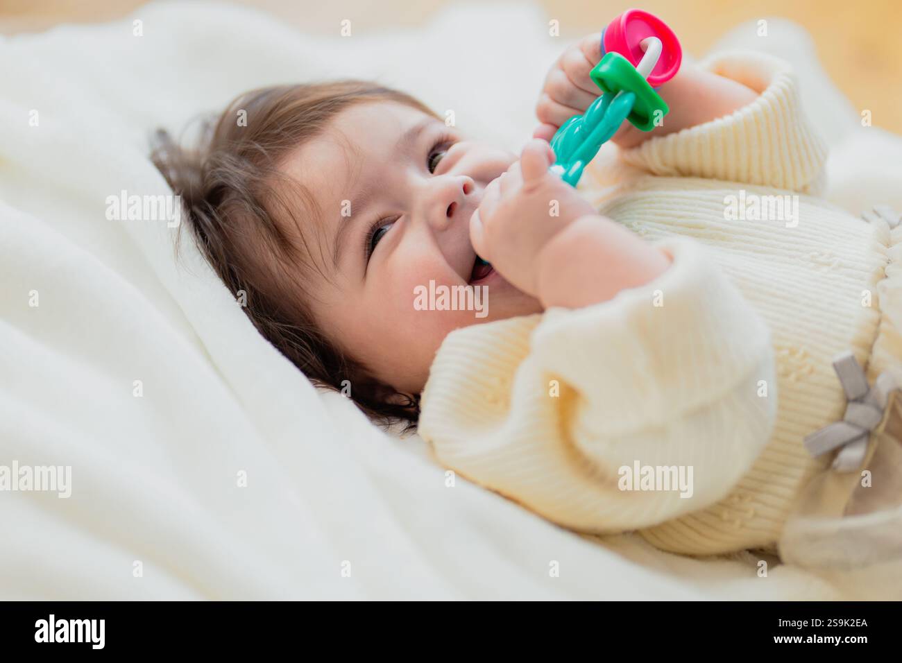 Baby chewing toy Stock Photo - Alamy
