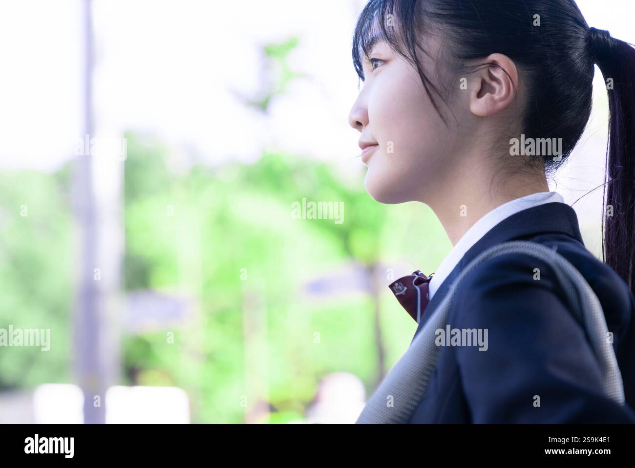 High school students at bus stop Stock Photo - Alamy