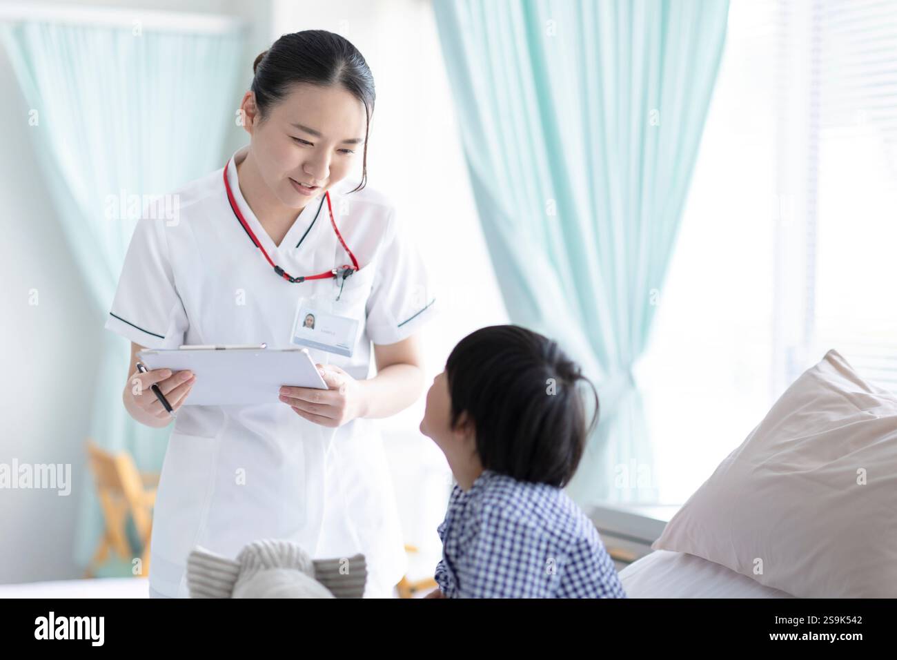 Nurse and patient boy Stock Photo - Alamy