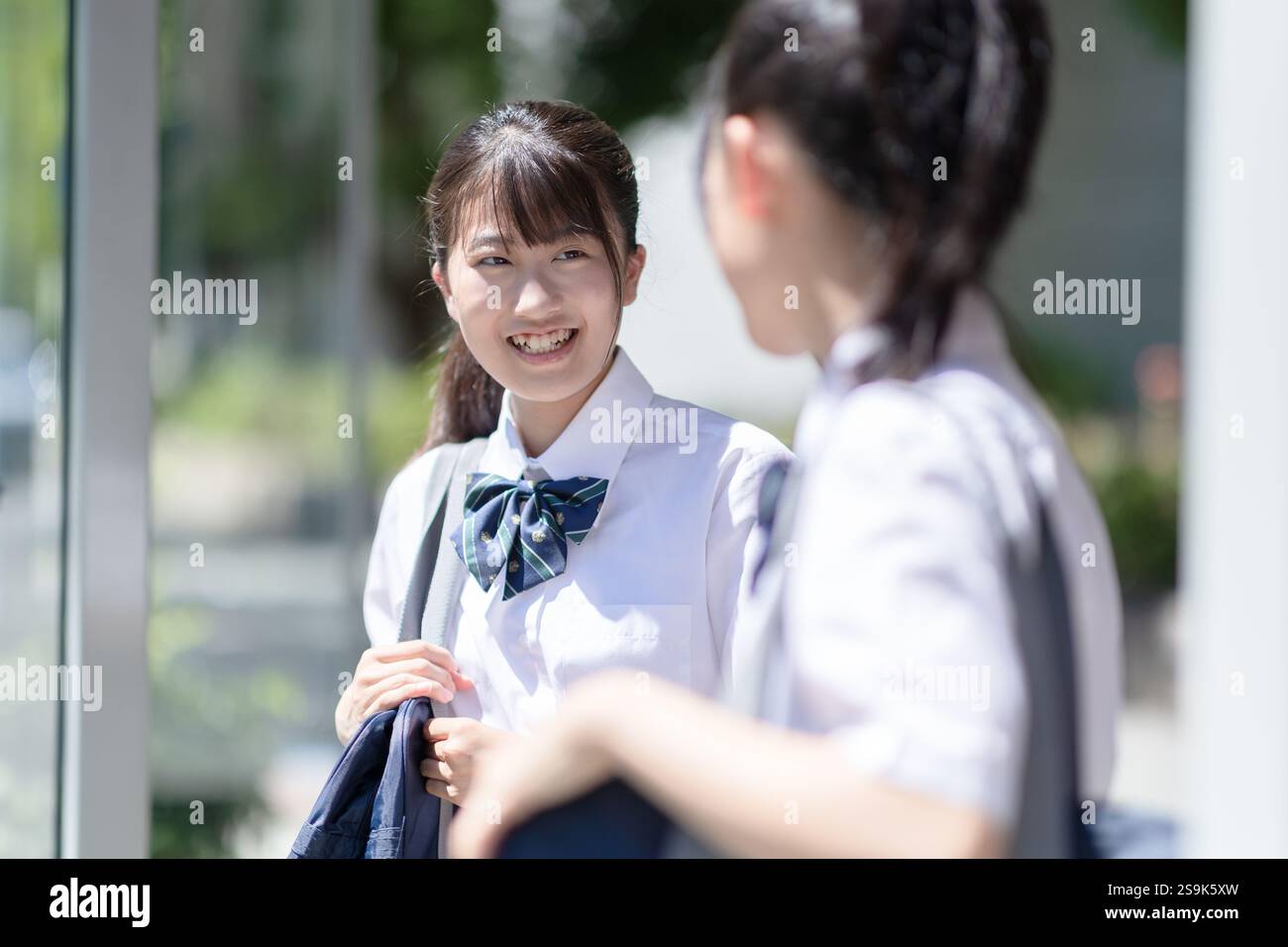 Student having a conversation Stock Photo - Alamy